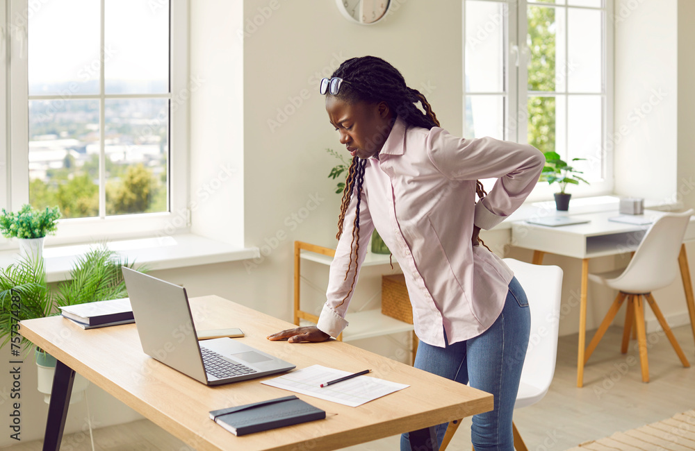 Corporate worker suffers from lumbago pain after sitting on ...