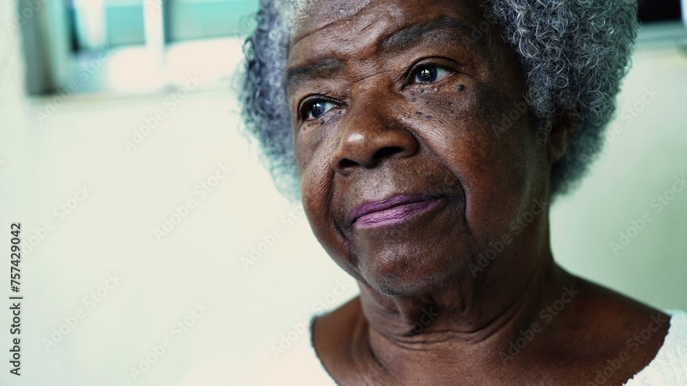 One pensive elderly black woman with gray hair and wrinkles. 80s ...
