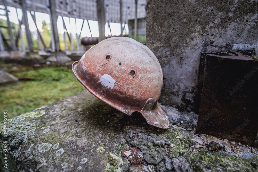 Old helmet in unfinished cooling tower of reactor 5 of Chernobyl ...