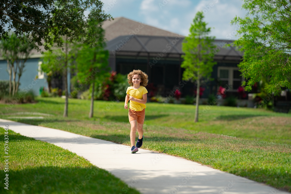 Excited Kid running in street. Amazed child enjoy run. Happy little boy ...