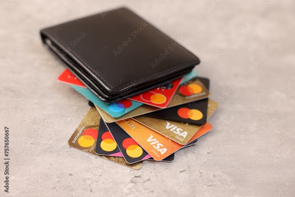 LEIDEN, NETHERLANDS - MARCH 07, 2024: Bank cards of Visa and Mastercard ...