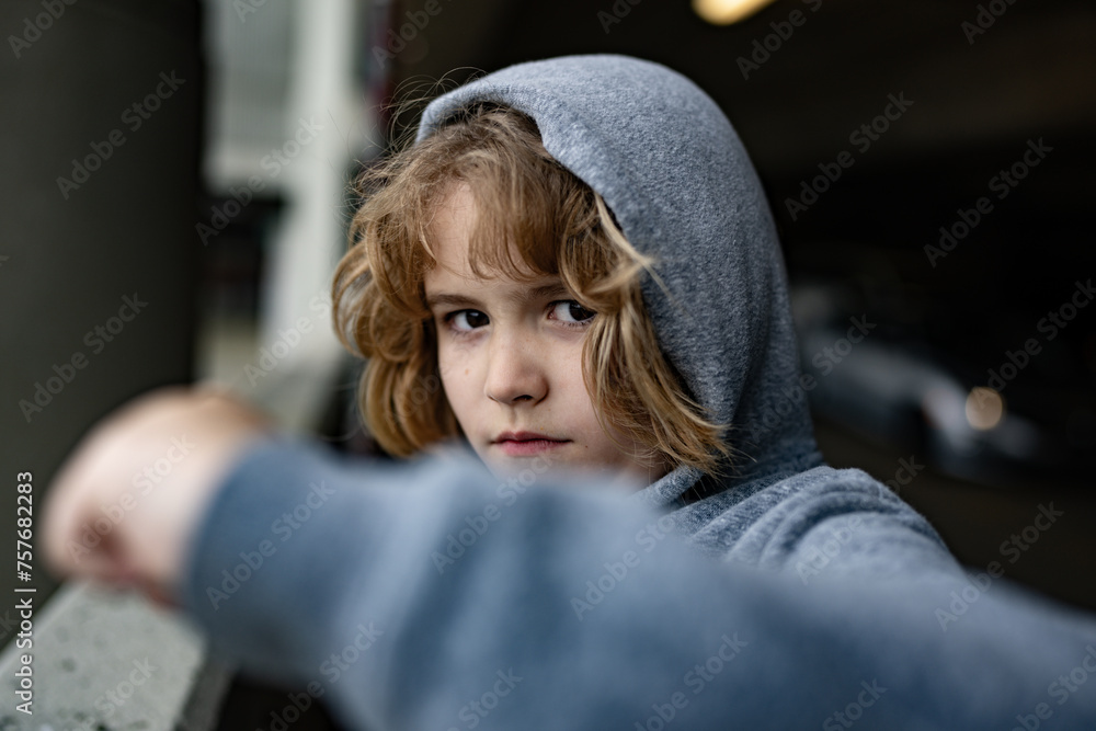 Aggressive anger child. Little kid boy anger on street. Angry little ...