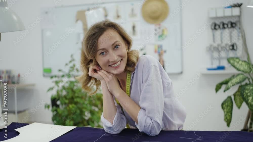 Female designer, portrait in atelier. Happy smiling designer woman ...