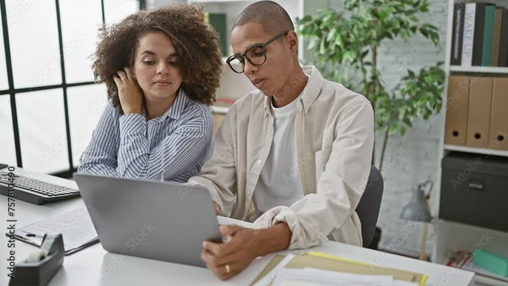 Confident man and woman coworkers hustling together! two dynamic ...
