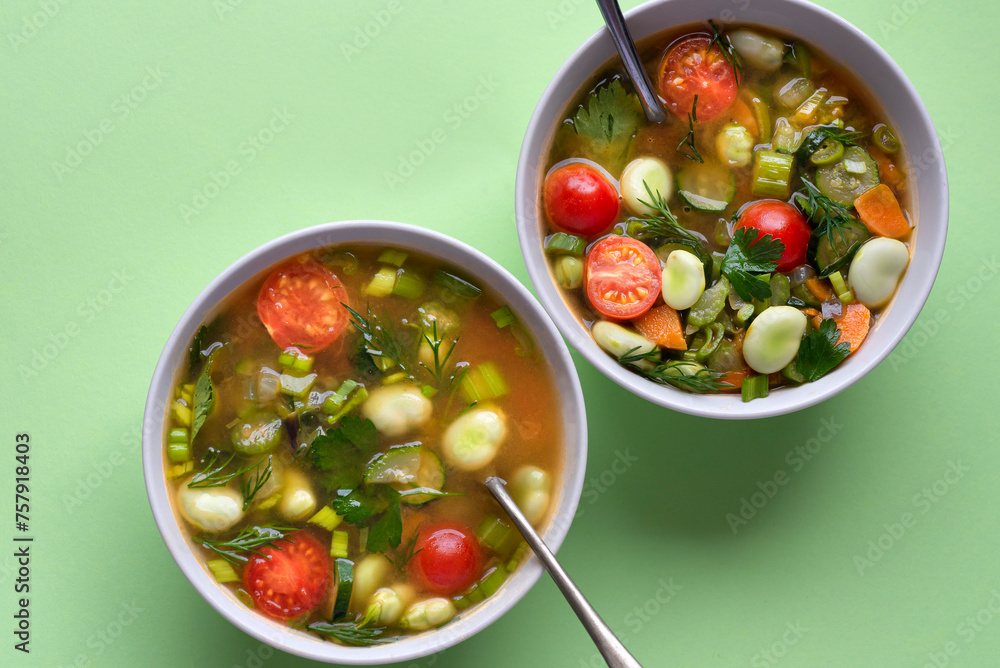 Spring minestrone with fave beans, tomatoes, celery, carrots and ...
