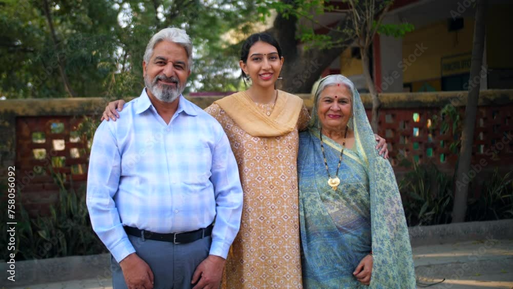 Well groomed Indian family - young daughter old parents successful ...