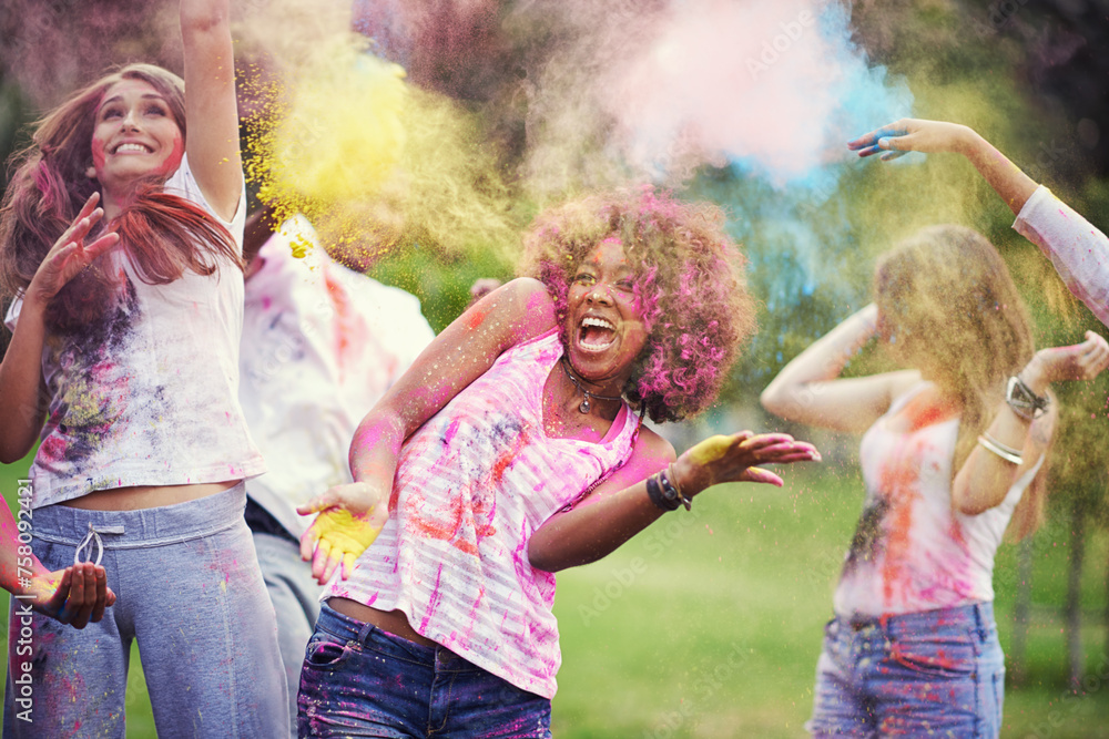 Friends, happiness and powder paint at color festival in park, fun with ...