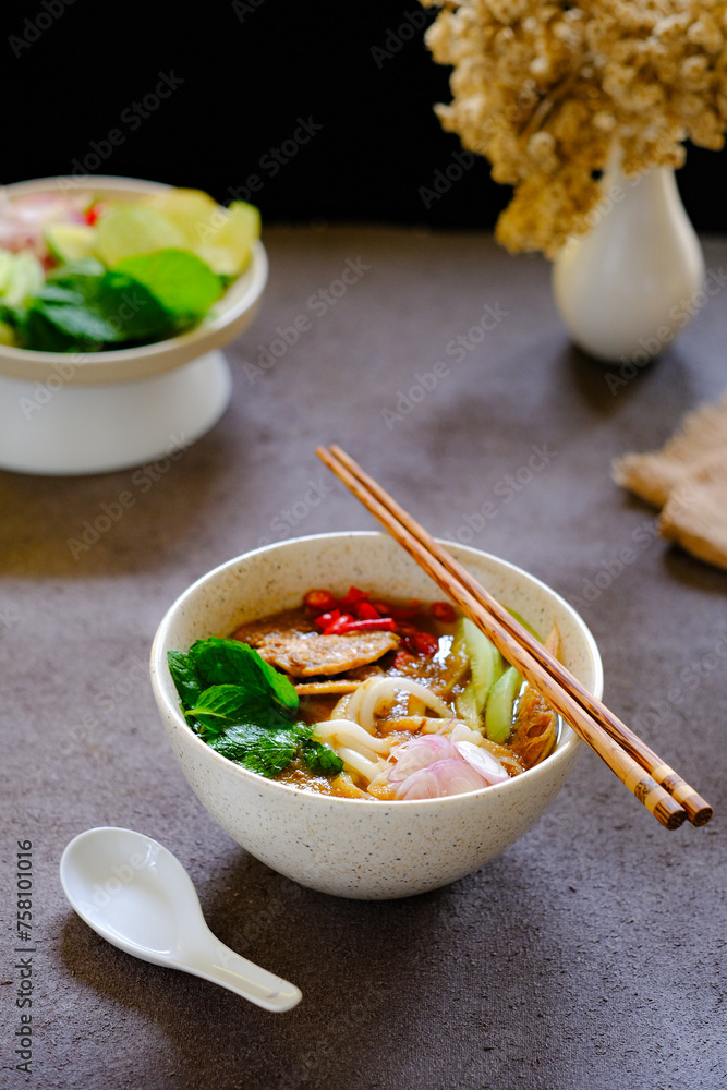 laksa ikan, asam laksa, rice noodle,vegetables, filet fish with sour ...