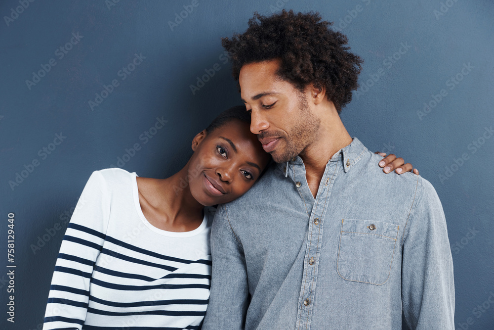 Happy, portrait and black couple hug with love on studio background ...