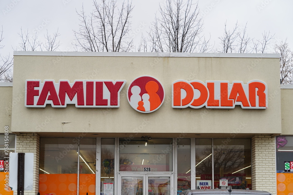 Family Dollar store sign on a building advertising to the community ...