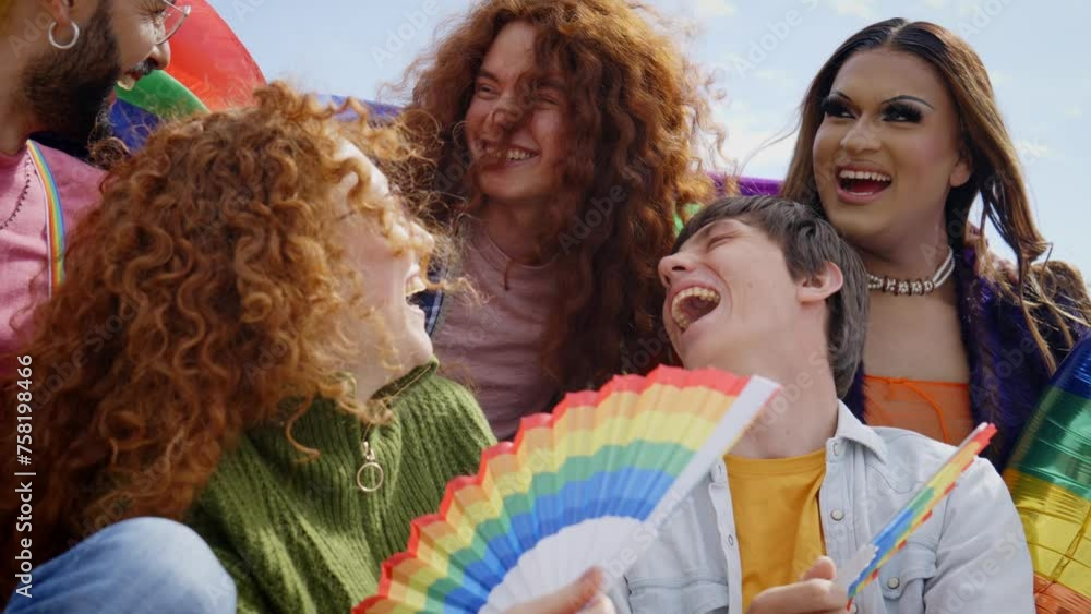 A diverse group of young people joyfully celebrating Pride with ...