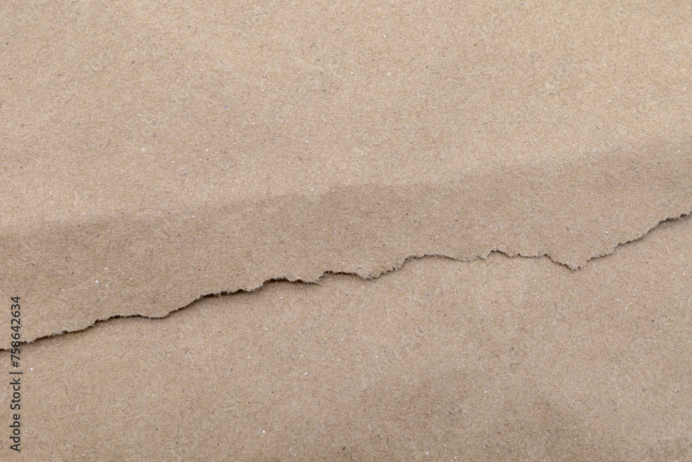 parcel brown for background, torn paper carton texture in top view ...