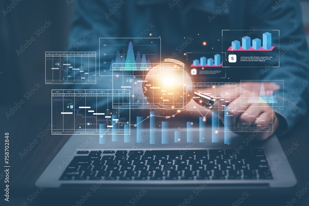 Businessman using computer for development and Analytics Data ...