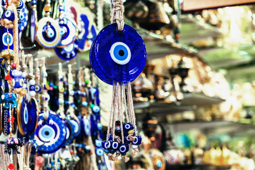 Turkish evil eye (Nazar boncugu) amulets glisten, a fusion of deep ...