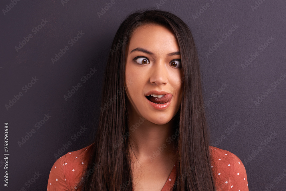 Woman, funny face and studio for comedy tongue out or mockup space ...
