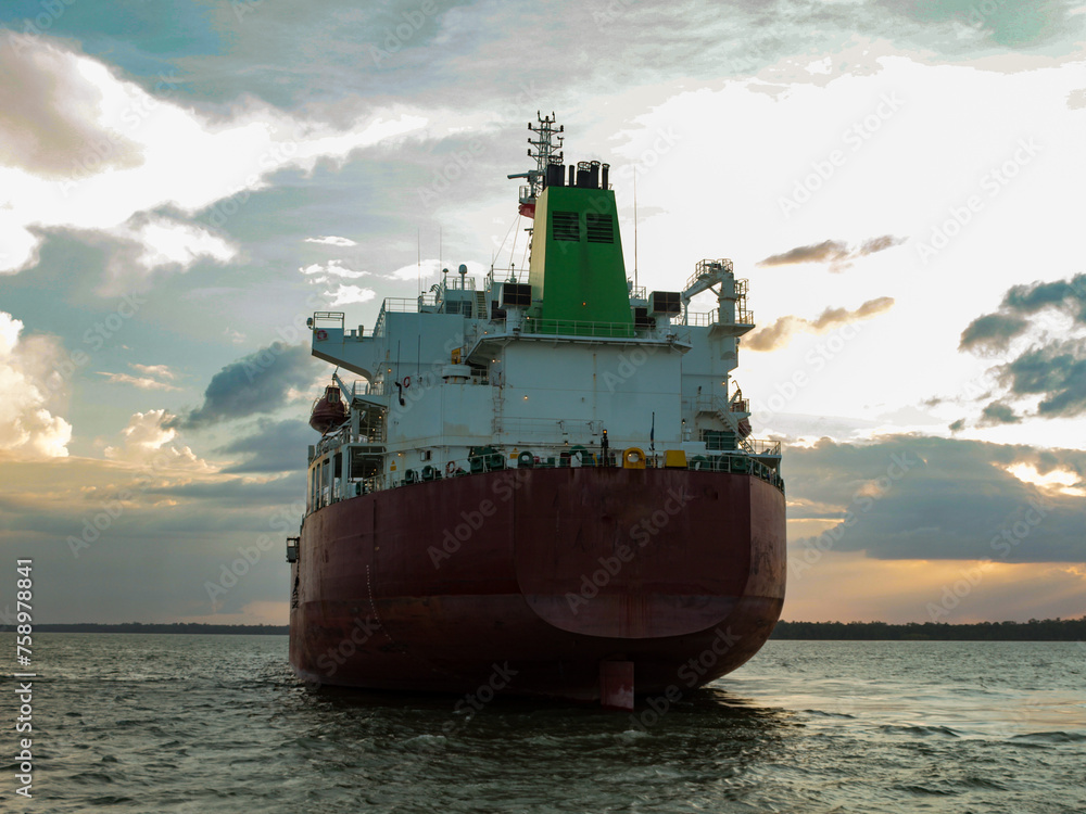 The stern of a merchant ship parked in Marajó Bay, in the state of Pará ...