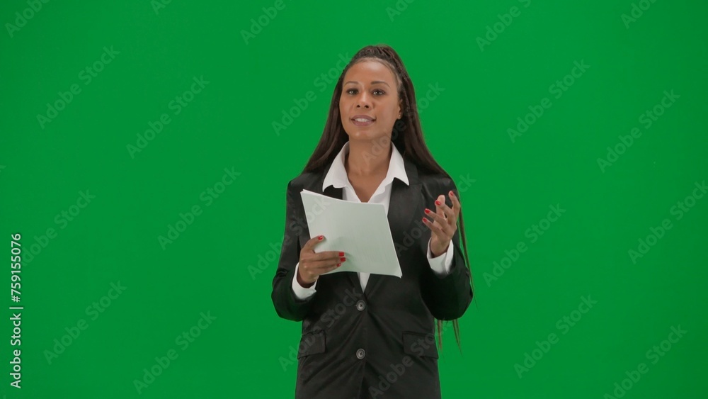 Female reporter isolated on chroma key green screen background. African ...