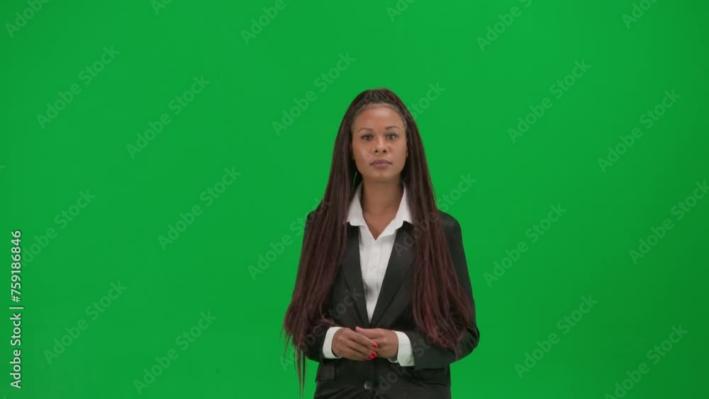 Female reporter isolated on chroma key green screen background. African ...