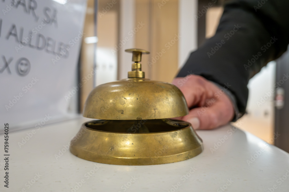 Stockholm, Sweden A bell in a reception area of a hospital and sign in ...
