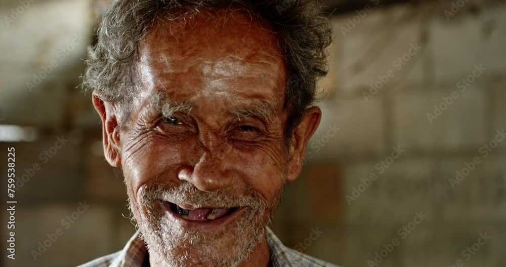 A smiling Asian man who is an elderly ragpicker or has a career ...