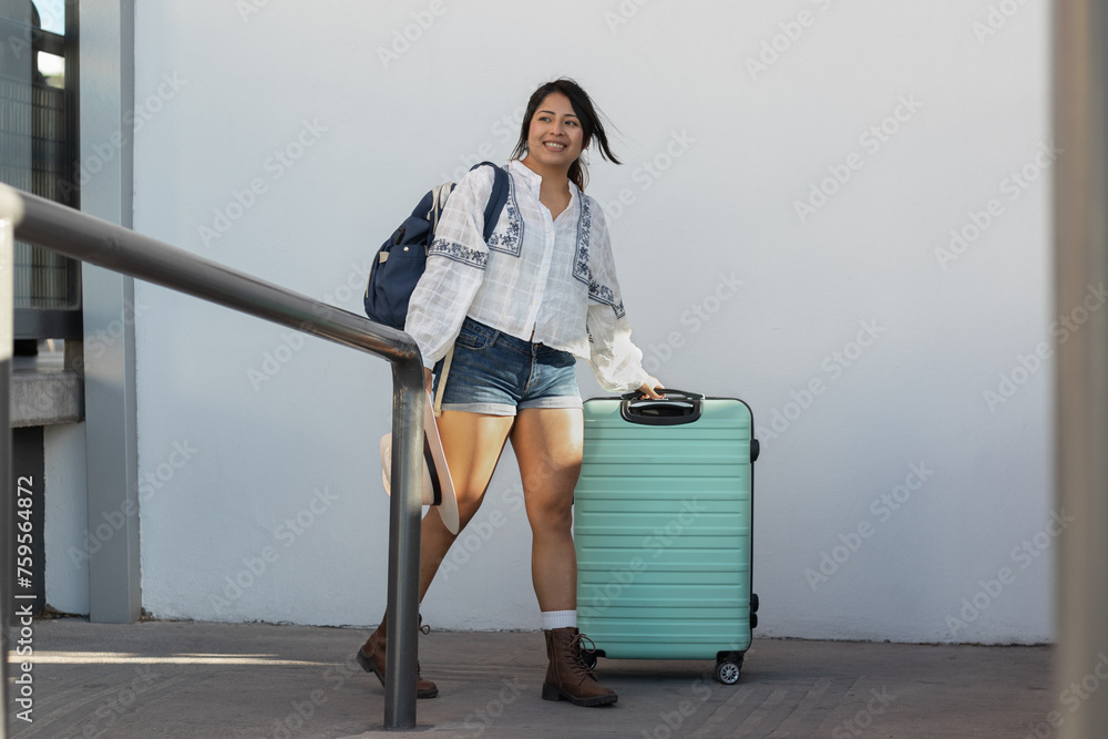 Horizontal photograph of a beauty young woman traveling alone through ...