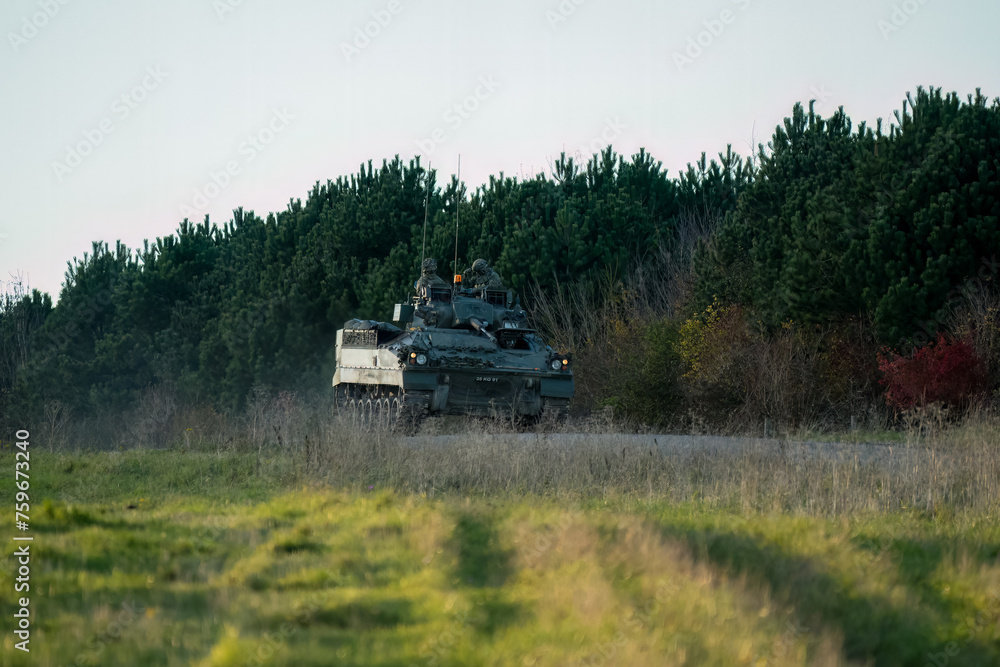 British army Warrior FV510 Infantry Fighting Vehicle in action on a ...