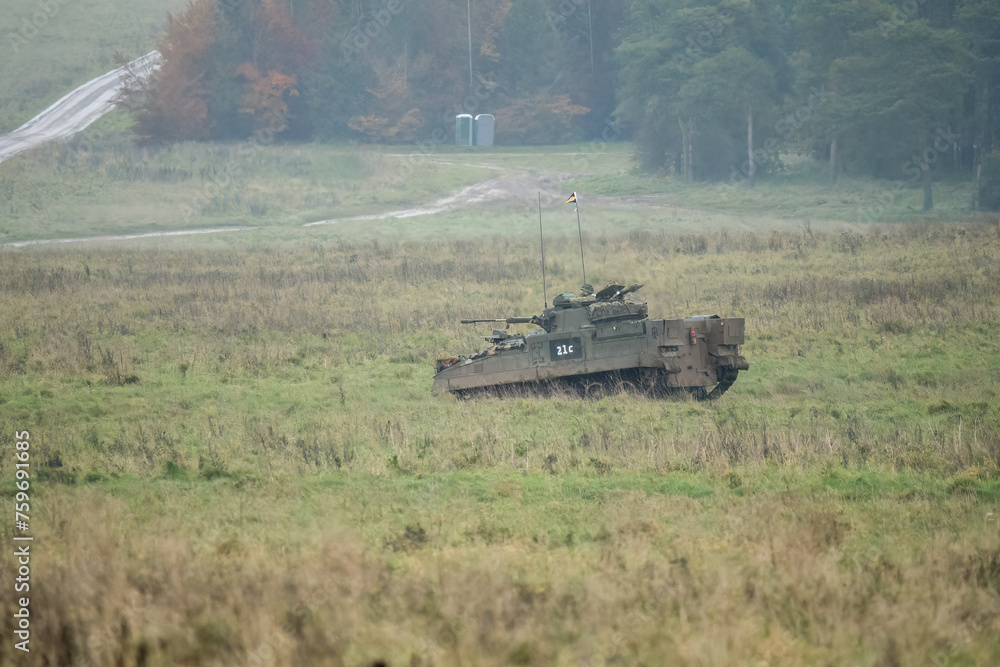 British army Warrior FV510 Infantry Fighting Vehicle in action on a ...