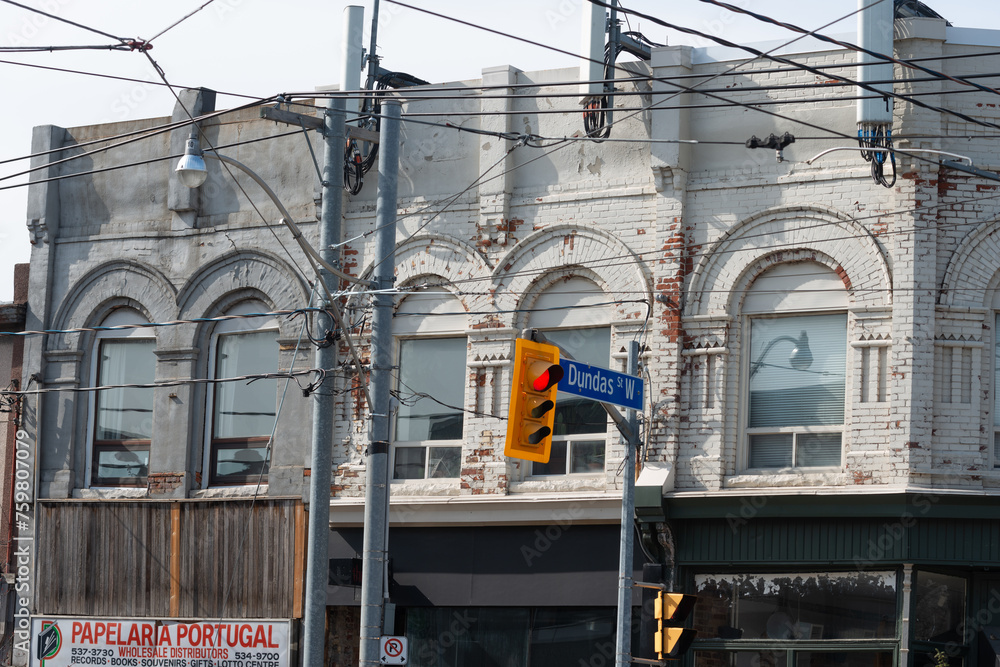 exterior building facade and sign of Papelaria Portugal, a convenience ...