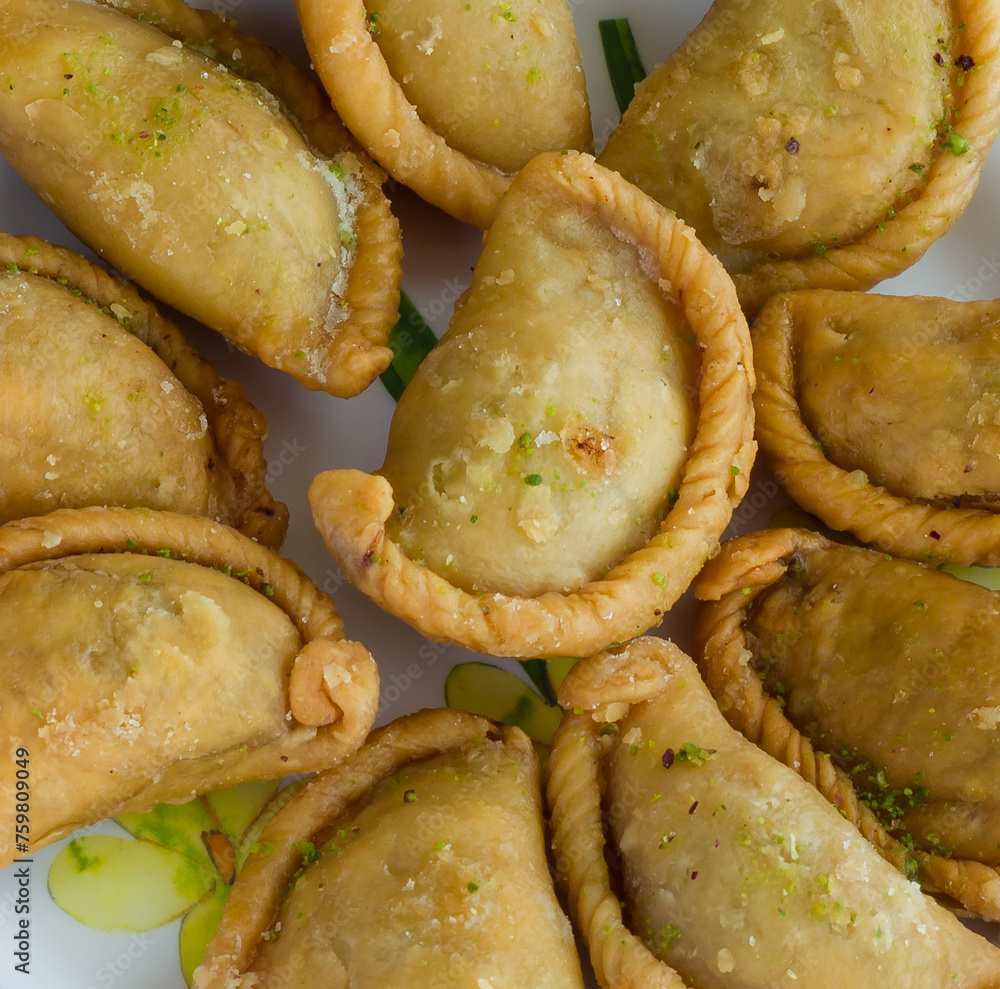 Gujia or Gujiya is a traditional Indian sweet or dessert made during ...