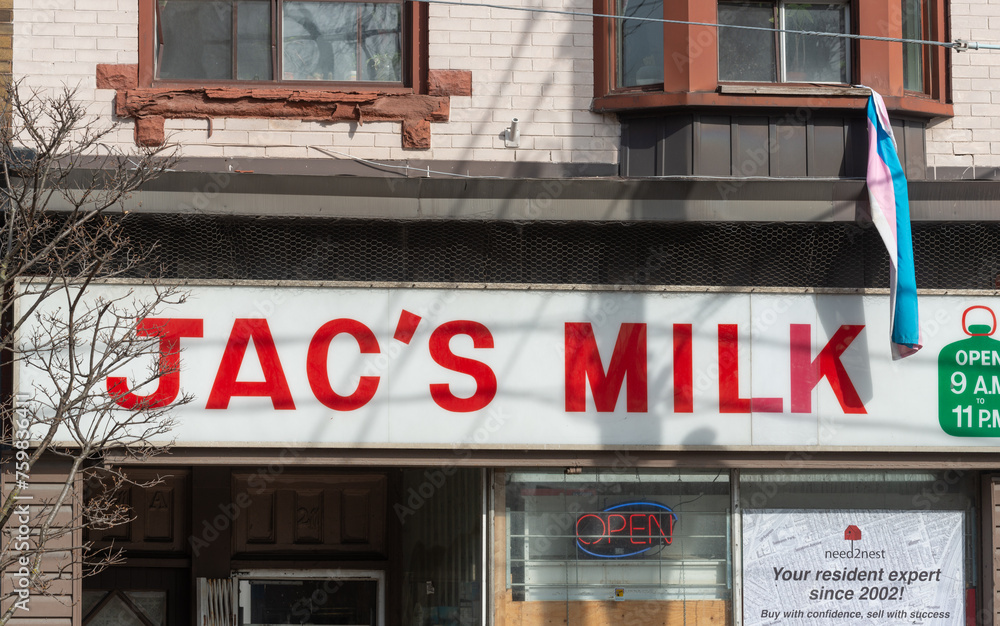 exterior building and sign of Jac's Milk, a convenience store, located ...