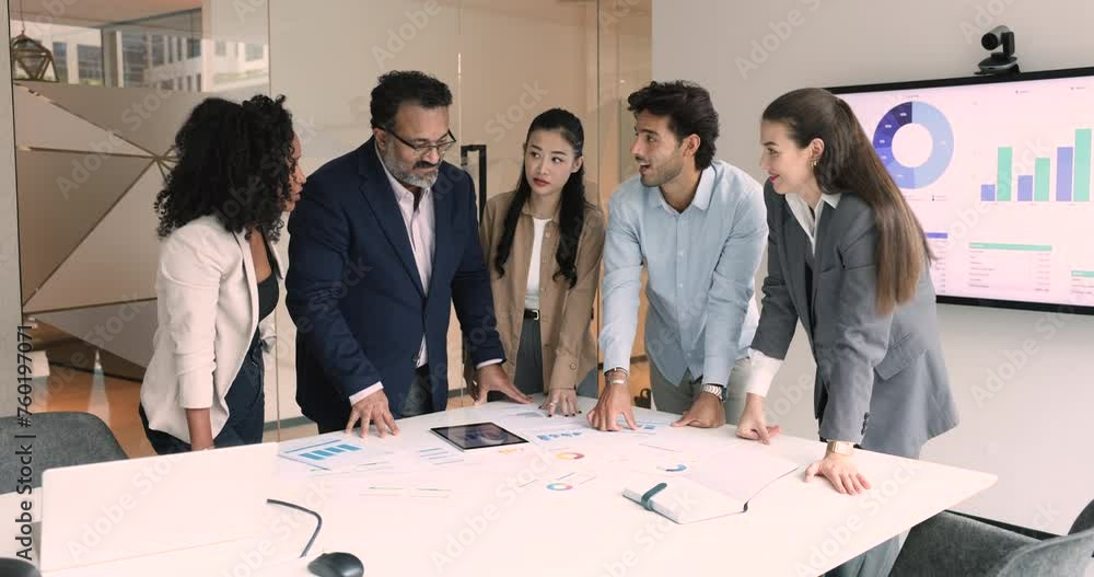 Happy cheerful diverse business team engaged in teamwork gathered in ...