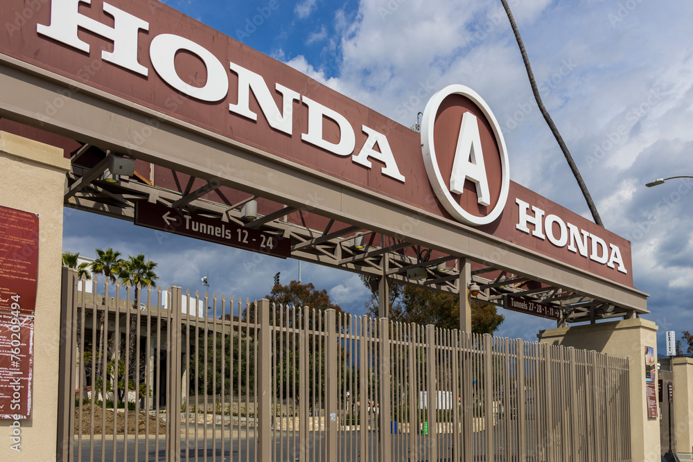 Honda Gate A at the Rose Bowl Stadium surrounded by tall lush green ...