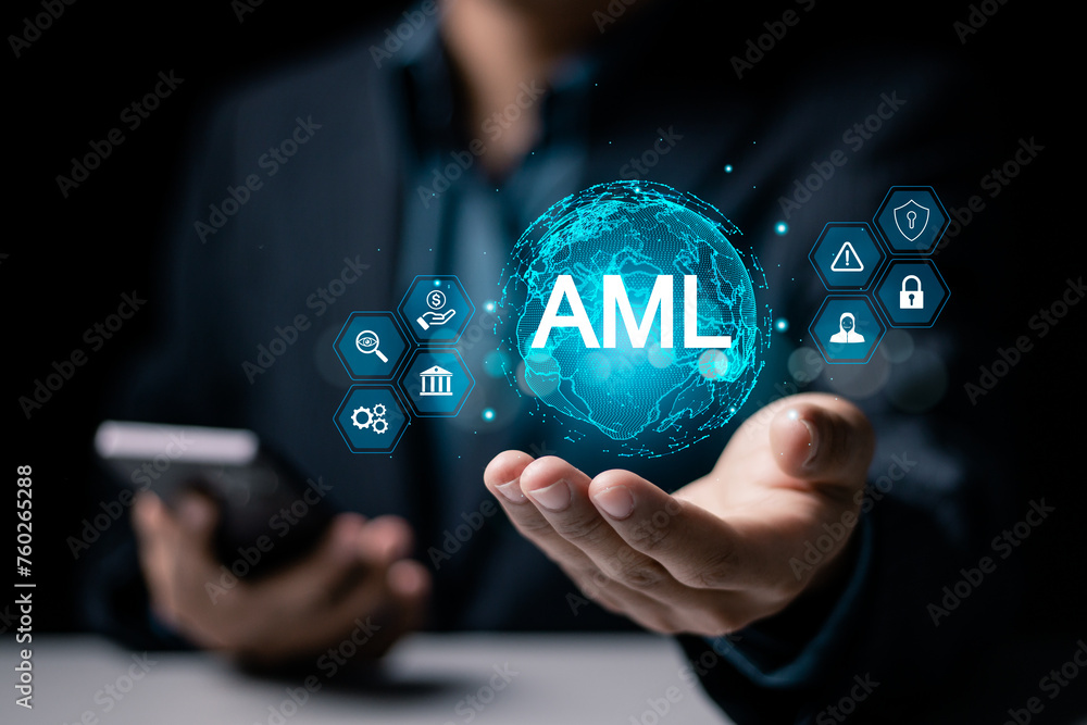 AML, Anti money laundering financial bank concept. Businessman holding ...