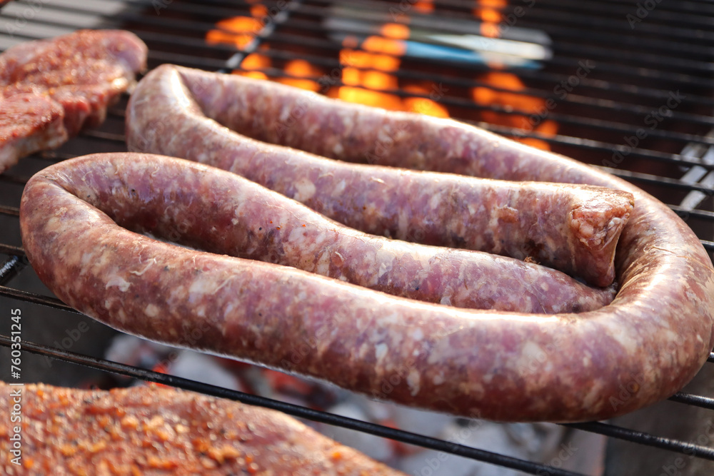 sausages on grill. South African braai meat. Boerewors or wors Stock ...