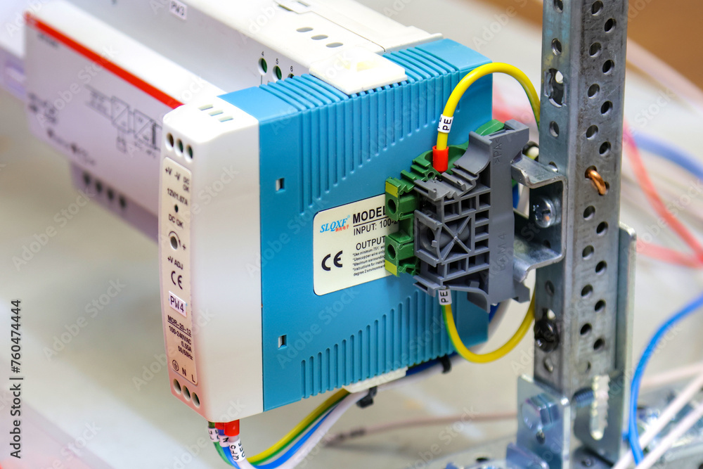 Electronic control modules for apartment automation are installed in an ...