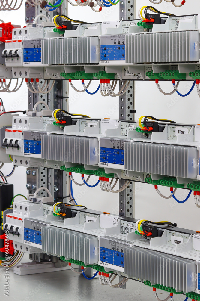 Electronic control modules for apartment automation are installed in an ...