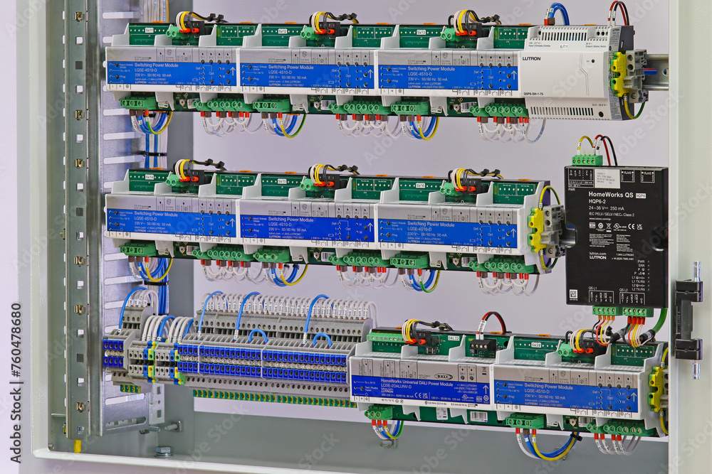 Electronic control modules for apartment automation are installed in an ...