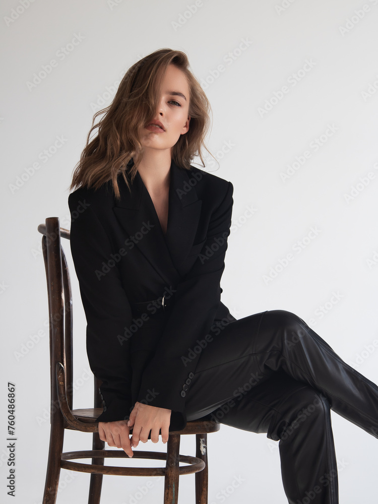 Beauty model woman in Leather pants . Model test portrait with young ...