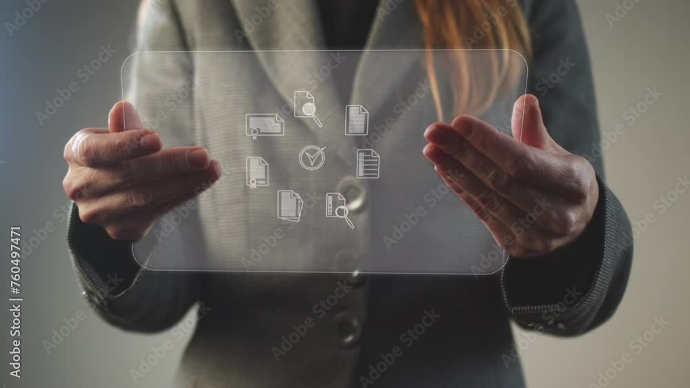 Cg footage. A businesswoman holds in her hands a transparent ...