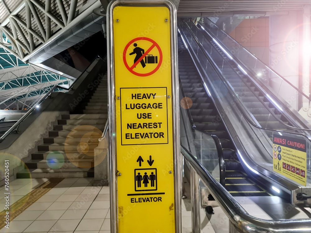 heavy baggage sign board using elevator Stock Photo | Adobe Stock