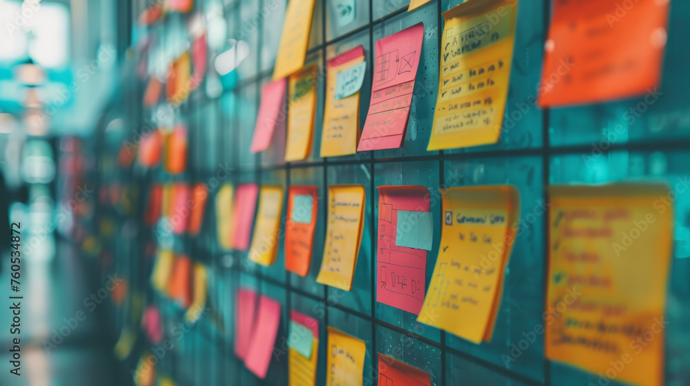 A wall covered with colorful sticky notes, some with hand-written ...