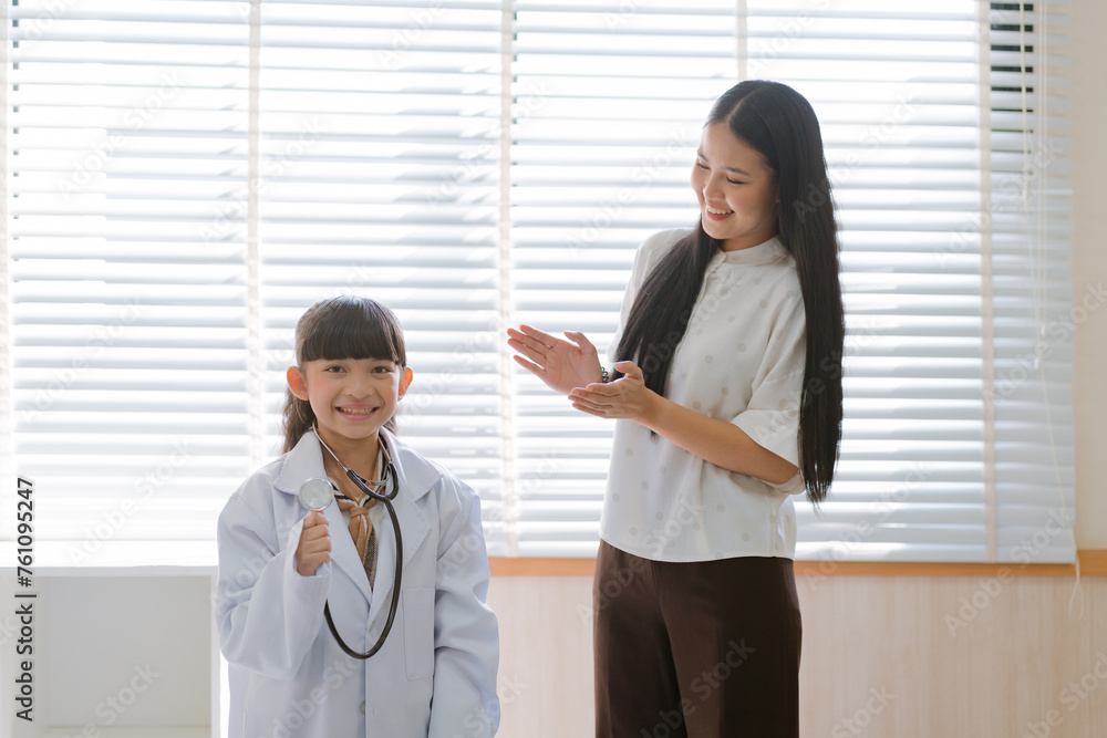 Doctors encourage young girls who dream of becoming doctors by wearing uniforms and giving hugs ...