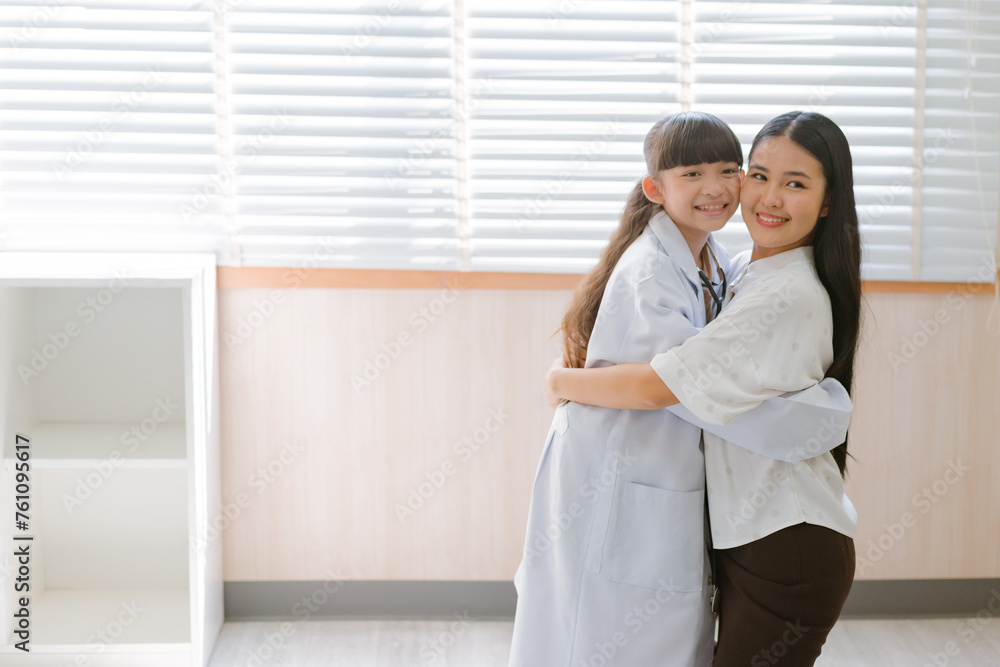 Doctors encourage young girls who dream of becoming doctors by wearing ...
