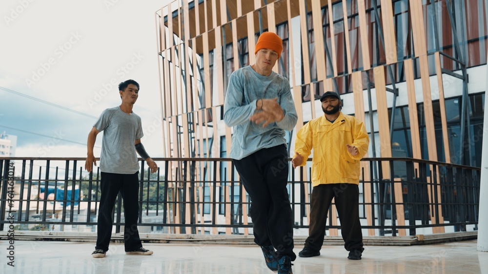 Hip hop team dance break dance while multicultural friend surrounded ...