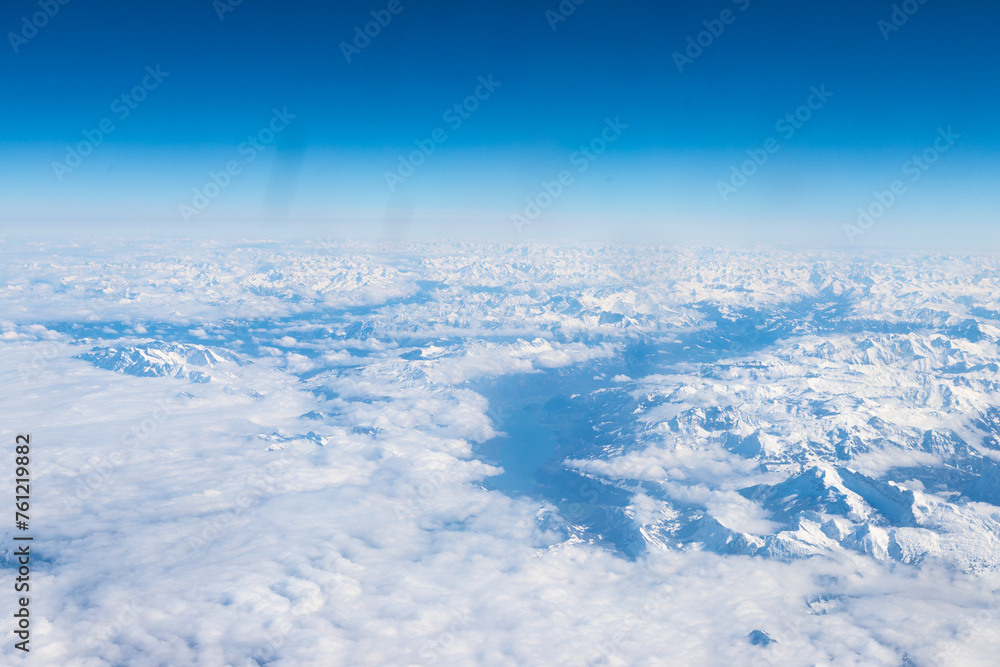 An aerial view of the Alps, a European mountain range and also the ...