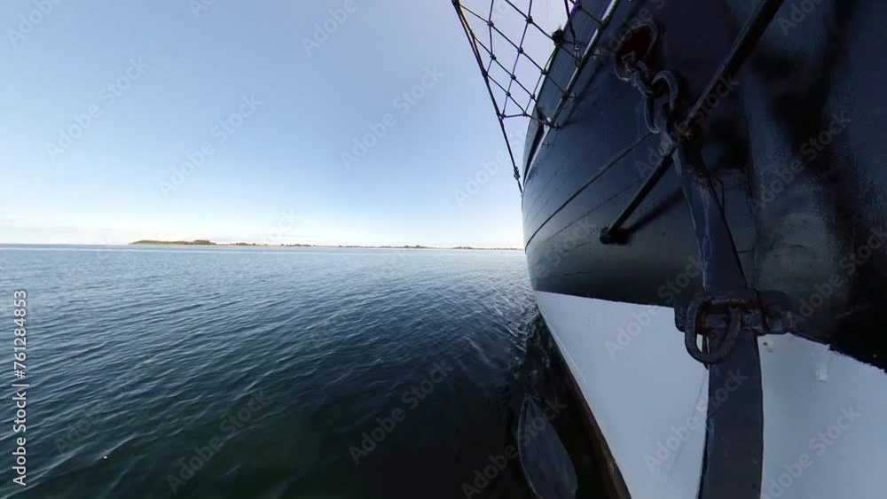 Old Sailing Ship with Sun and blue Sky - Side View near Water Surface ...