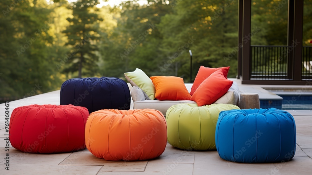 Use outdoor poufs and ottomans for flexible seating options. Stock ...