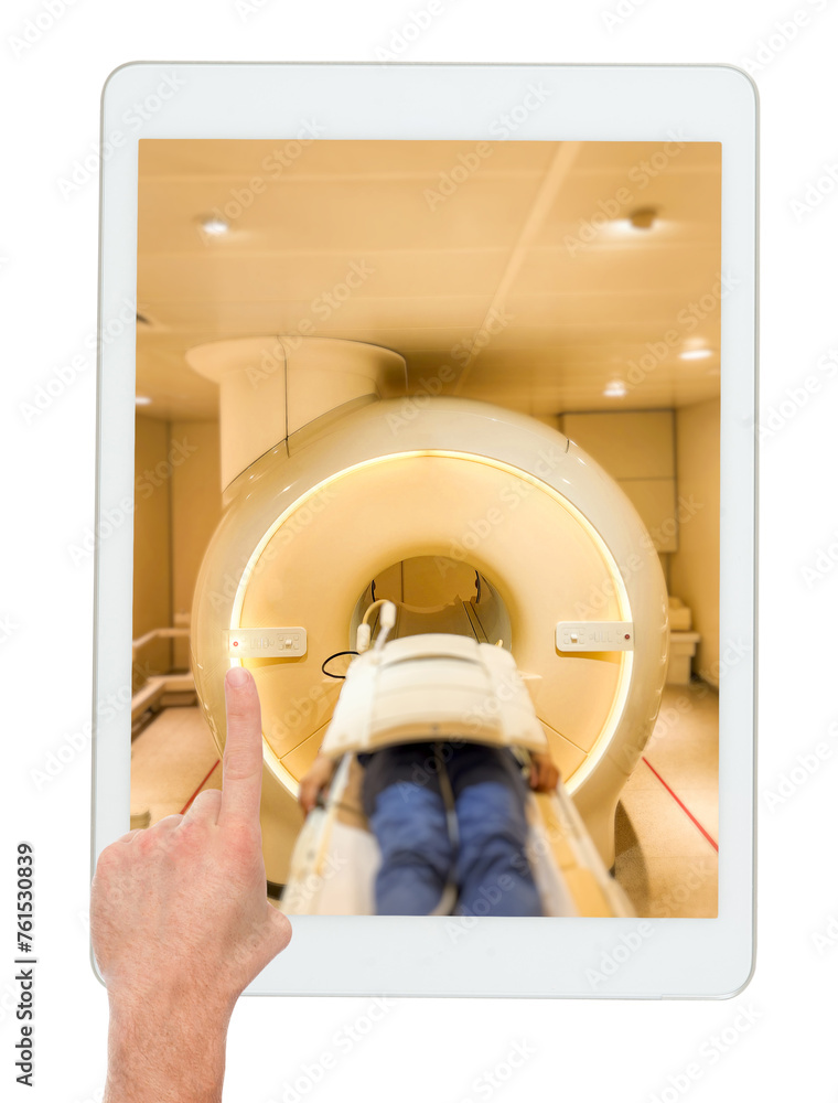 A patient lies down comfortably on the MRI scanner, undergoing a ...