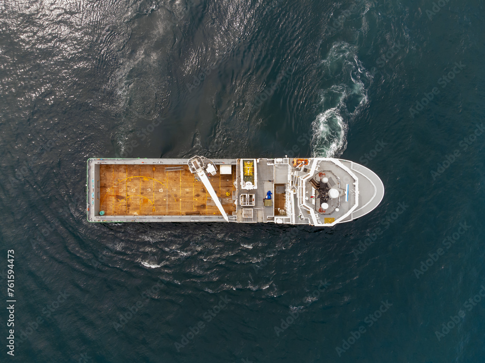 ASD Offshore supply vessel from above, testing propulsion. Aft azimuth ...