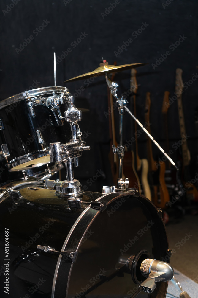 Part of a drum kit with cymbals in a music studio, on stage. Background ...
